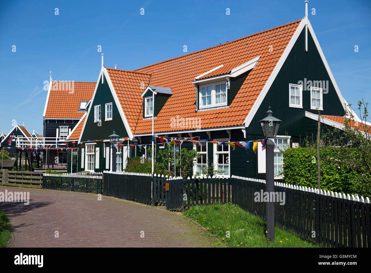 Old fishing green cottages on the island of Marken Netherlands Stock ...