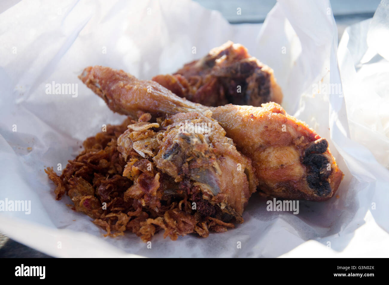 Hat Yai Fried Chicken recipes served with Onion fried Stock Photo - Alamy