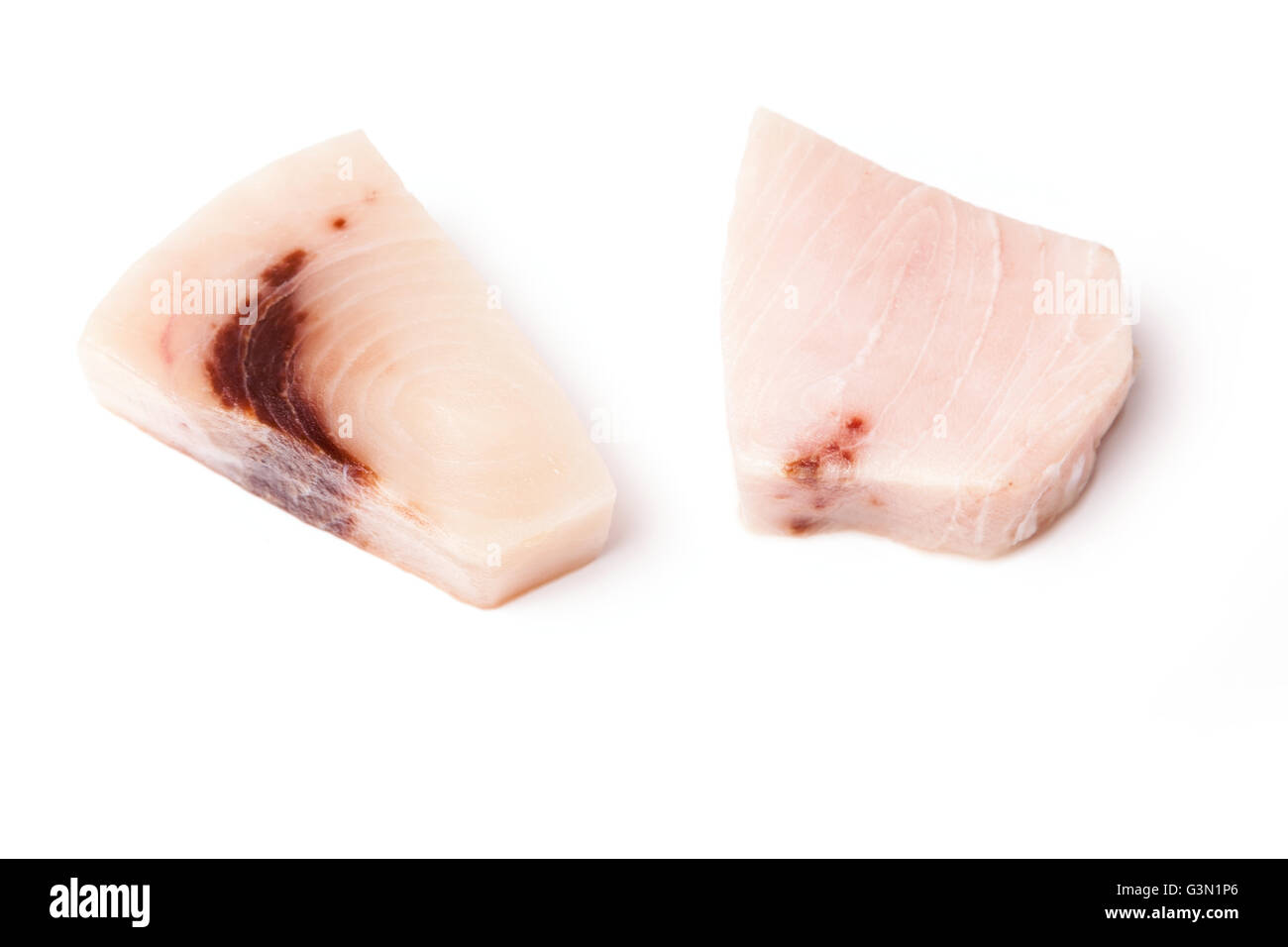 Swordfish ( Xiphais gladius) steak portion uncooked and isolated on a ...
