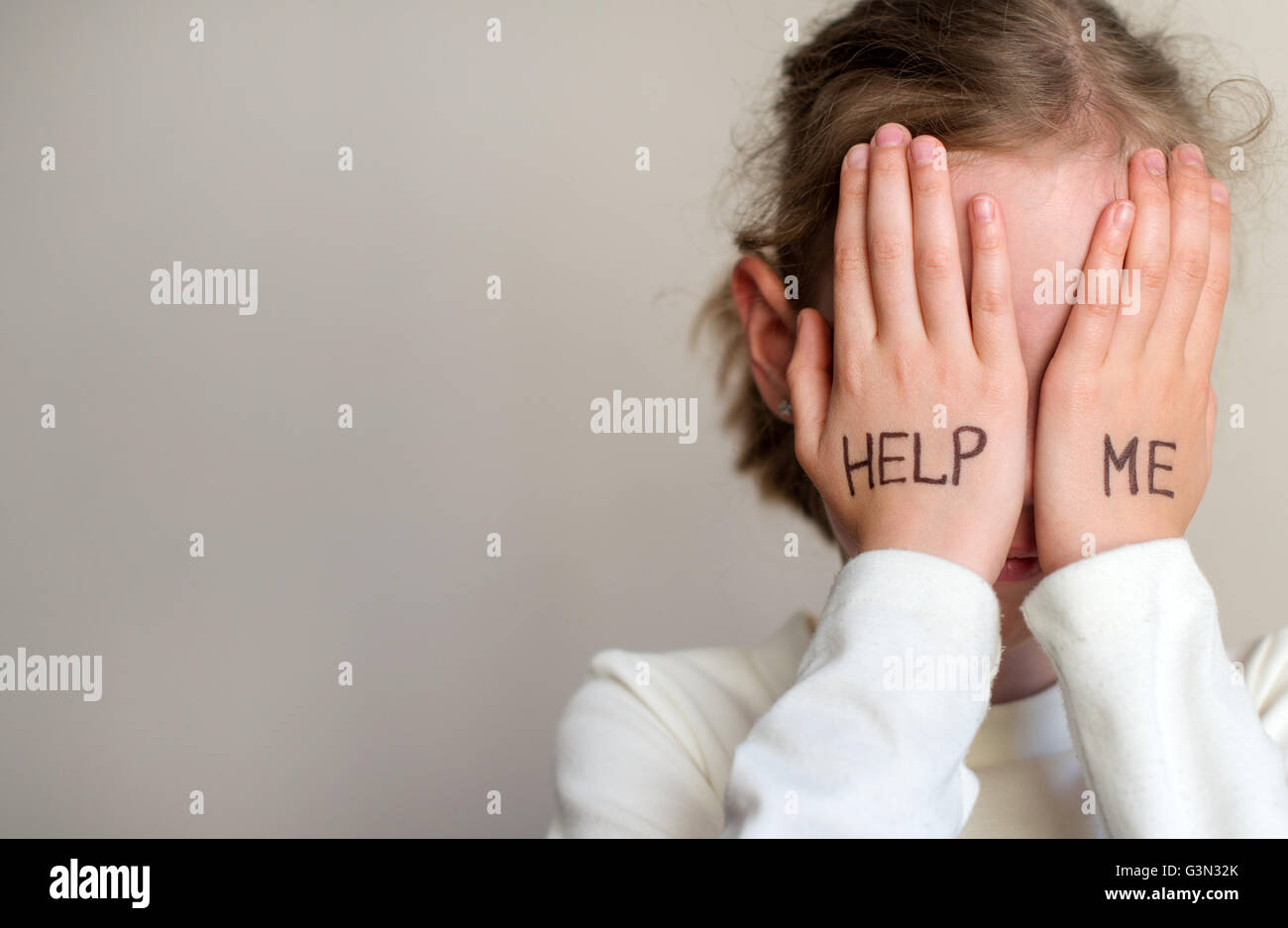 Child need help Stock Photo - Alamy