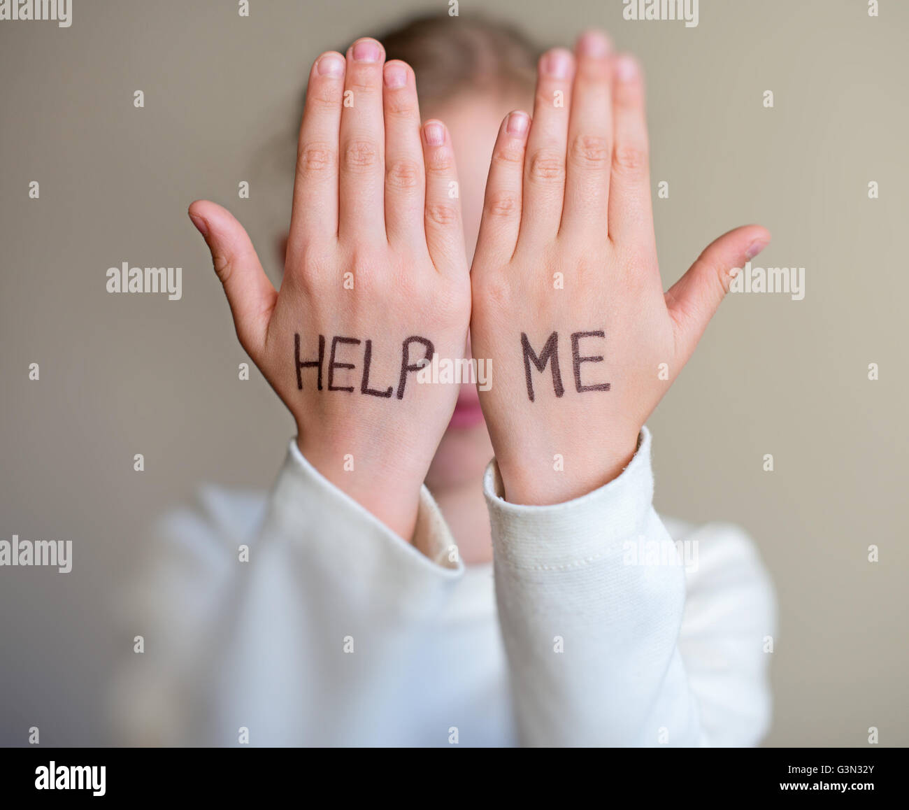 Child need help Stock Photo - Alamy