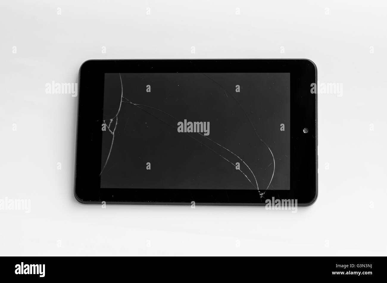 isolated detail of black broken tablet Stock Photo - Alamy