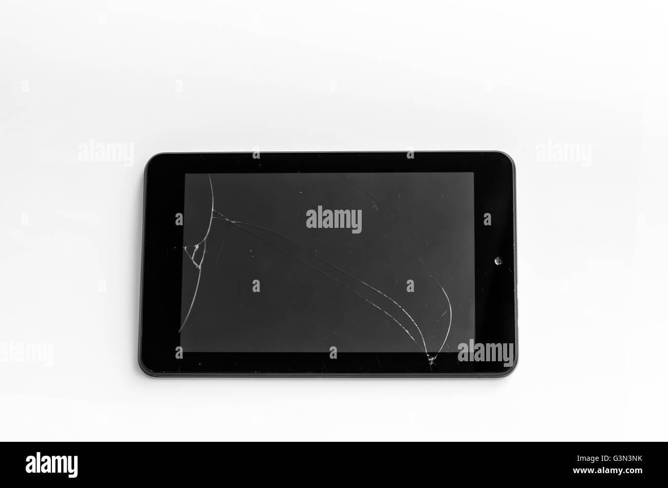 isolated detail of black broken tablet Stock Photo - Alamy