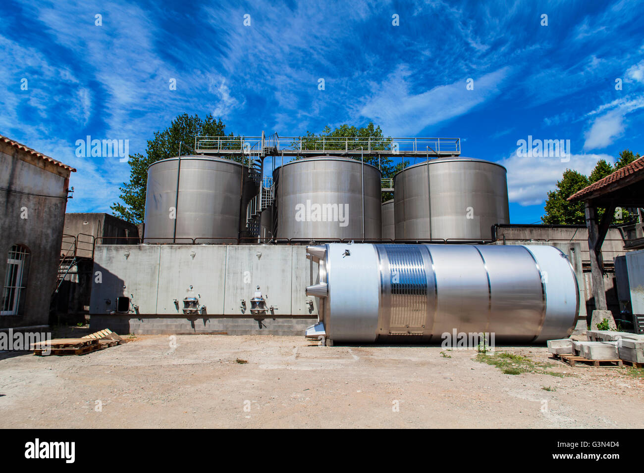 Wine reservoirs at the winery in Cruzy, France Stock Photo - Alamy