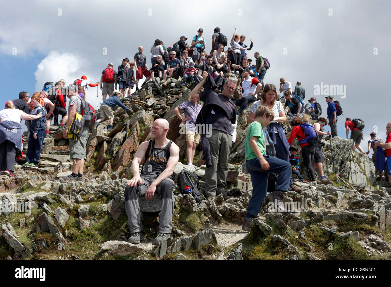 Landscape image showing crowds of walkers resting and taking in the ...