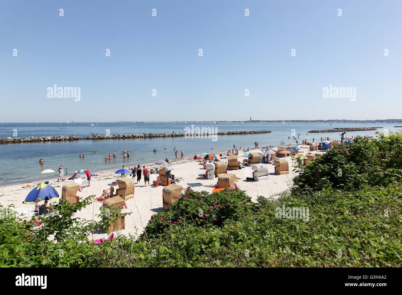Schilksee beach surrounding the Kiel fjord with typical hooded chairs ...