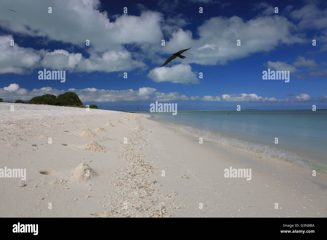 Pristine remote sandy beach in the blue lagoon of Christmas Island ...