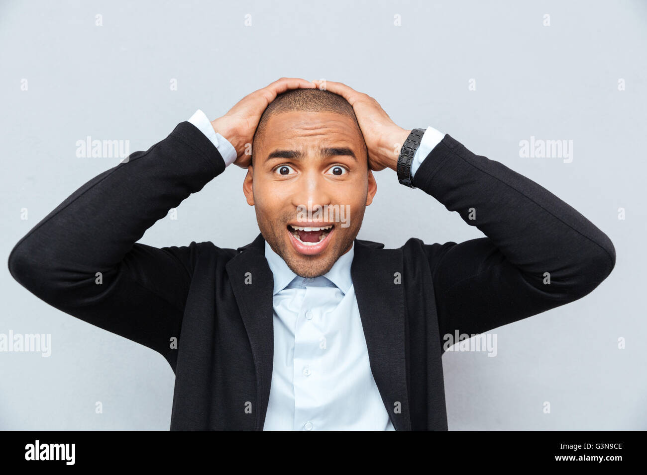 Close-up portrait of unhappy upset businessman guy isolated on gray ...