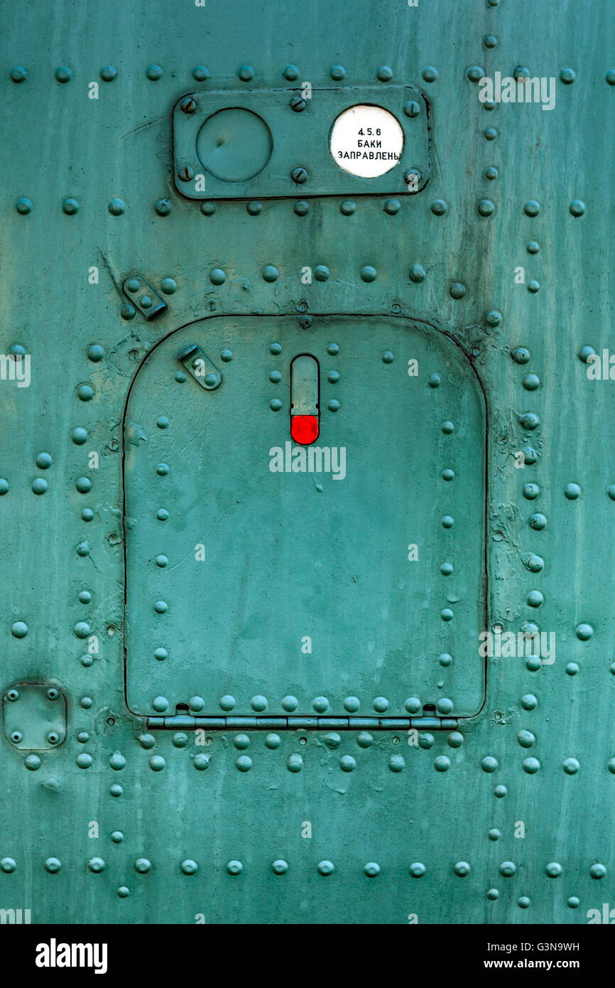 Old green painted aircraft hatch close up Stock Photo - Alamy