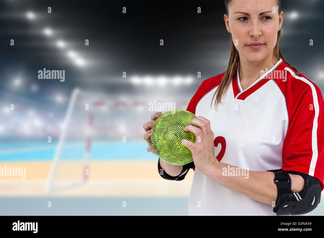 Young concentrated sportswoman holding hi-res stock photography and ...