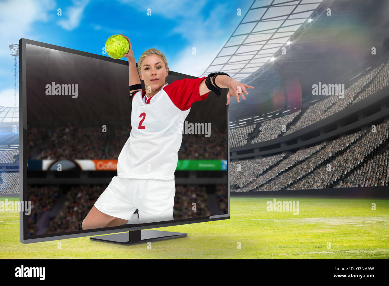 Composite image of sportswoman throwing a ball Stock Photo - Alamy