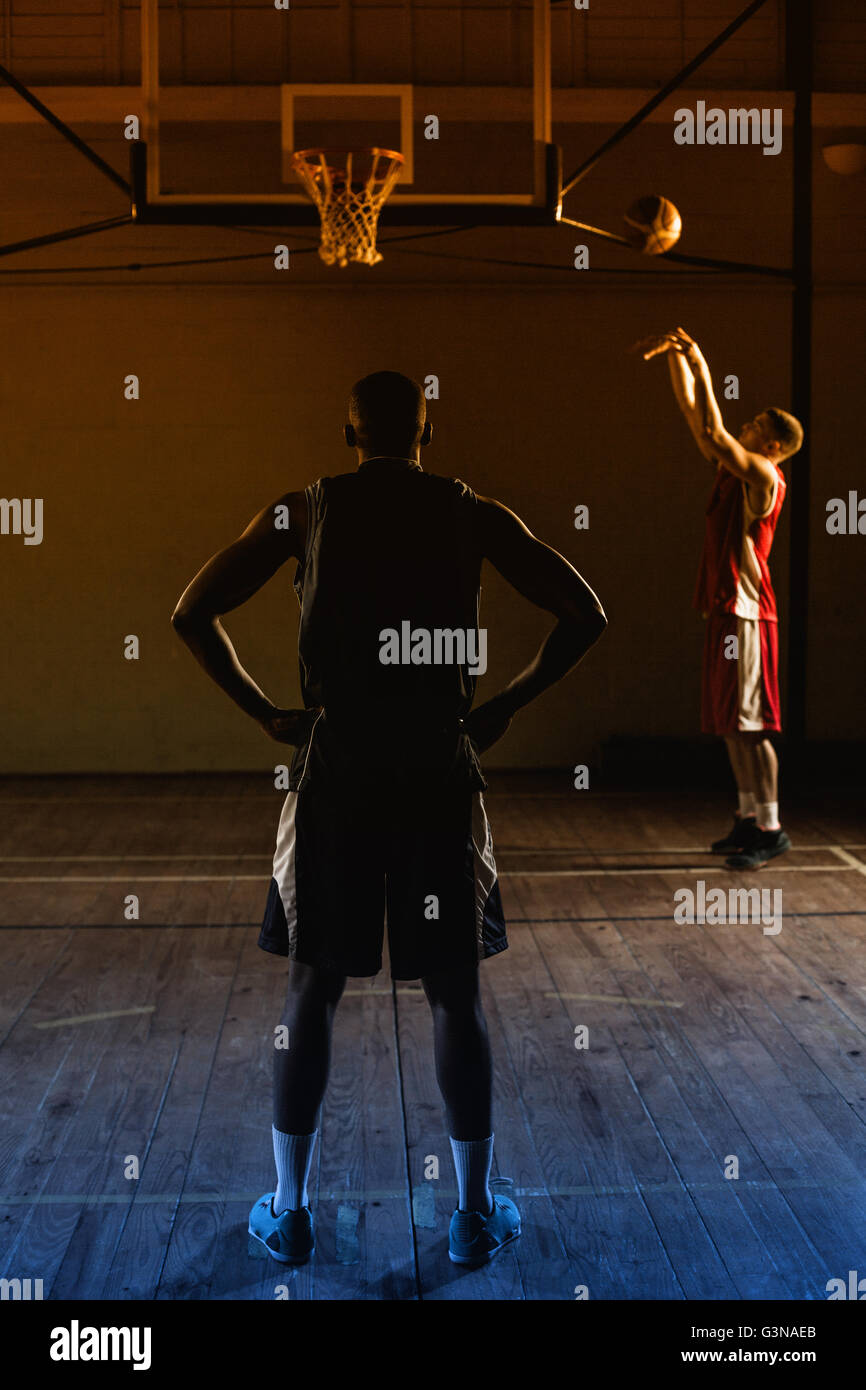 Basketball players training together Stock Photo - Alamy