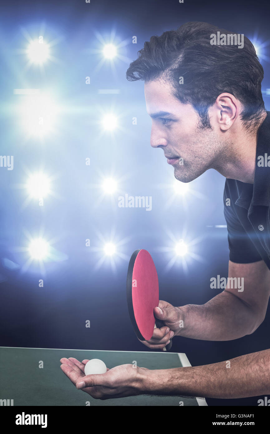 Confident male athlete playing table tennis Stock Photo - Alamy
