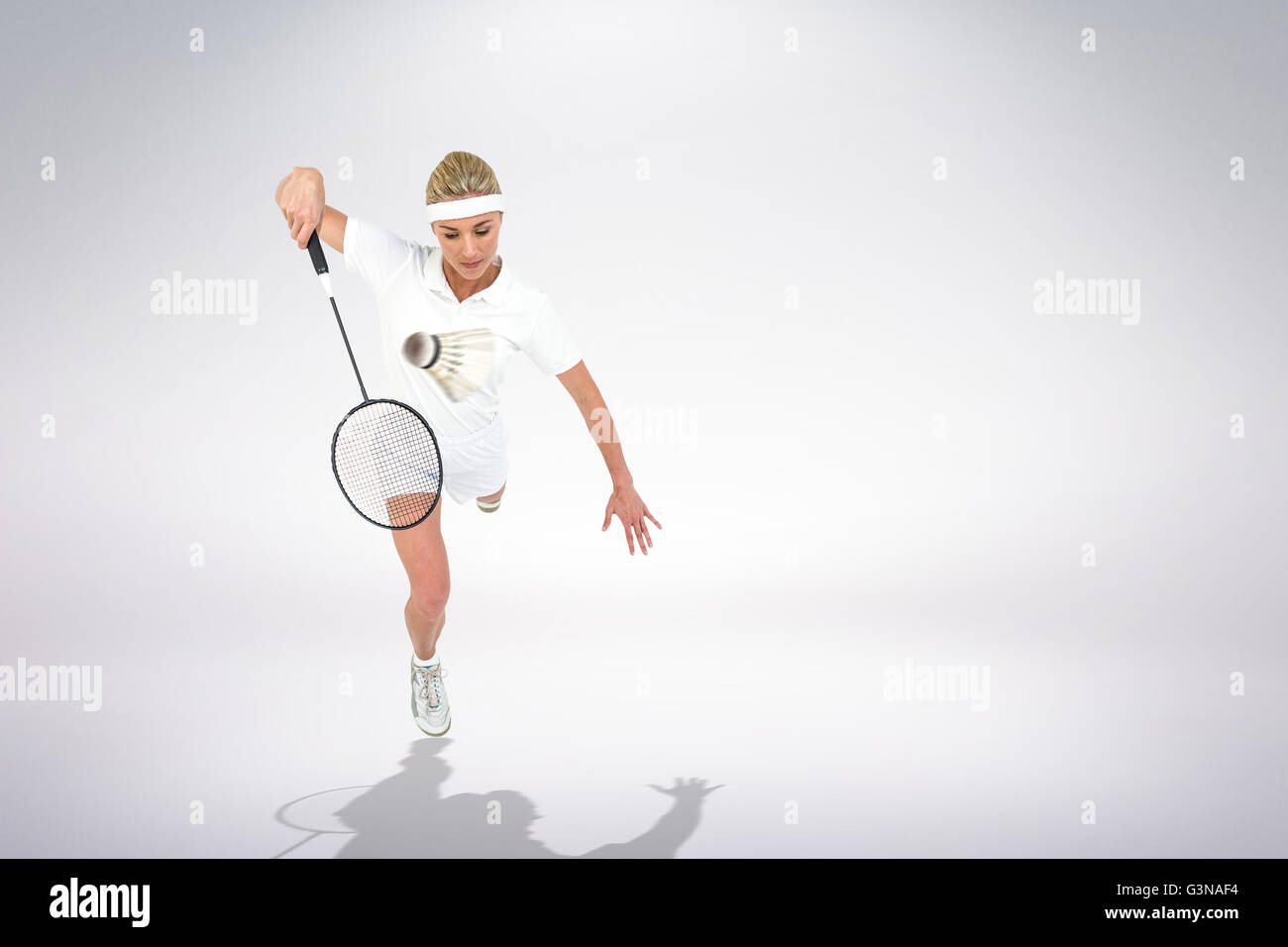 Pretty blonde playing badminton racket hi-res stock photography and ...