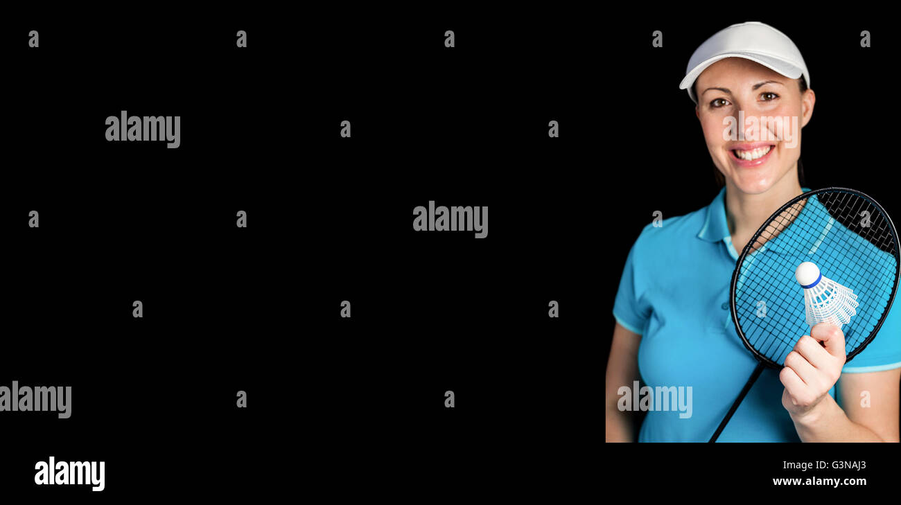 Happy badminton player holding badminton racket and shuttlecock Stock ...