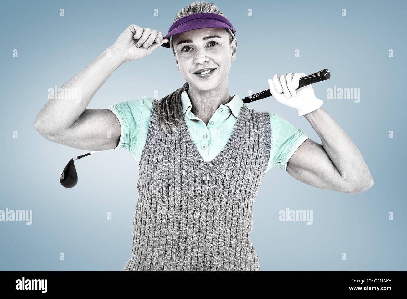 Composite image of pretty blonde playing golf Stock Photo - Alamy