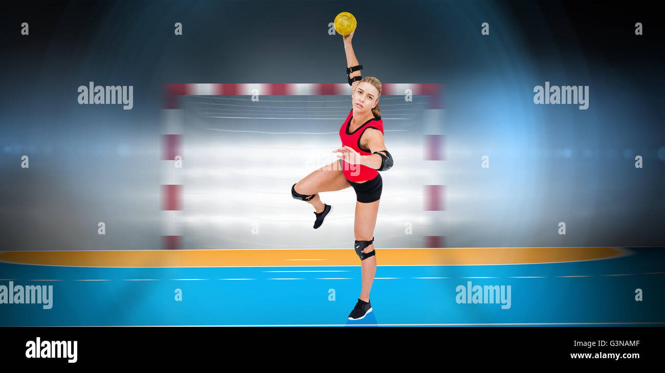 Female athlete throwing handball Stock Photo - Alamy