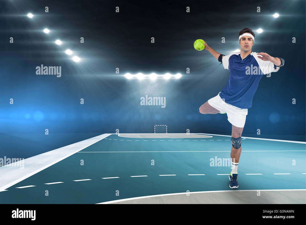 Portrait of sportsman throwing a ball Stock Photo - Alamy