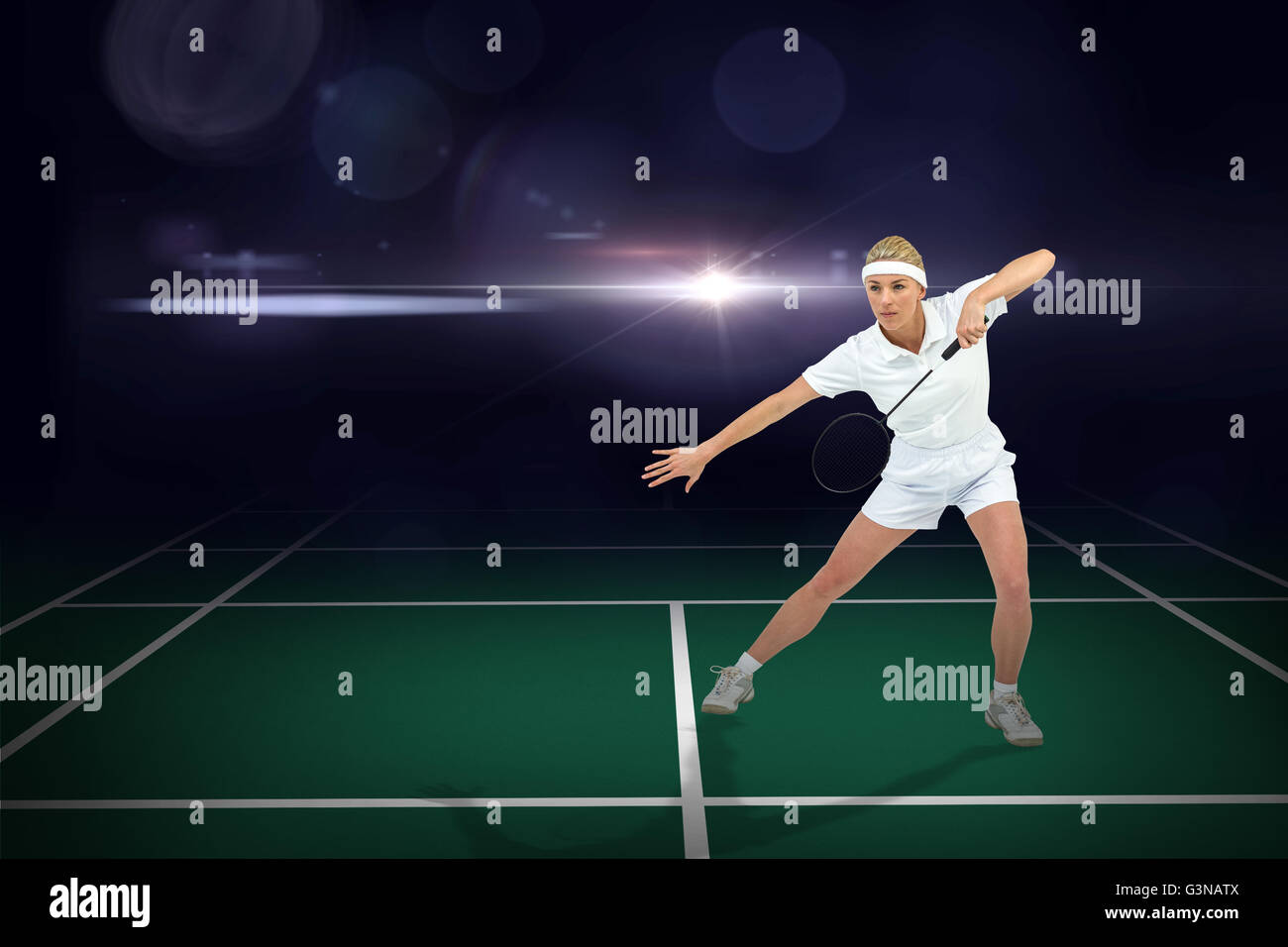 Composite image of badminton player playing badminton Stock Photo - Alamy