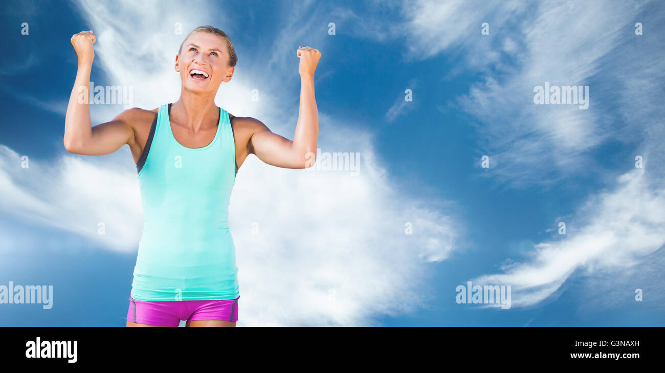 Athletic woman with arms up Stock Photo - Alamy