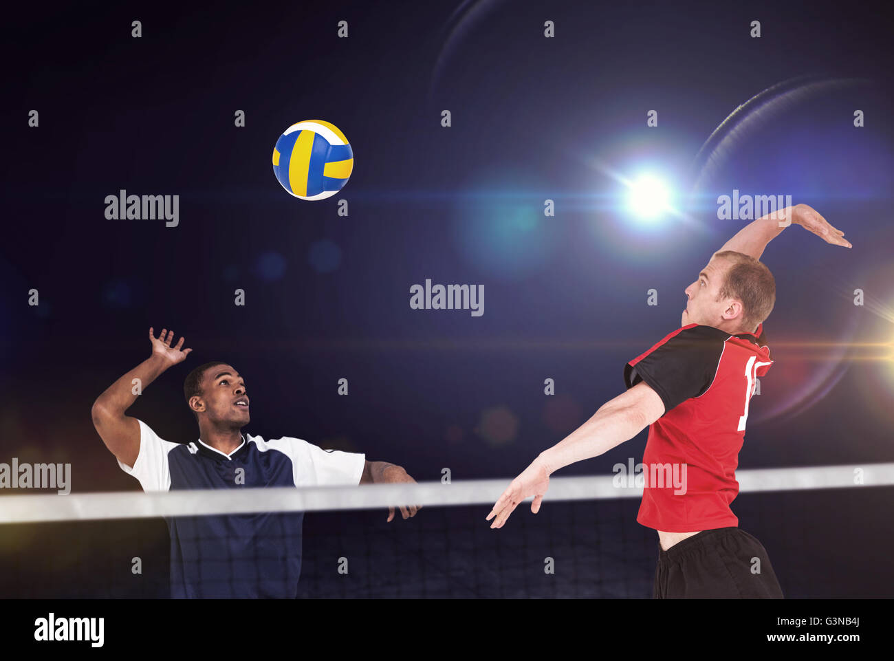 Young man jumping hitting volleyball hi-res stock photography and ...