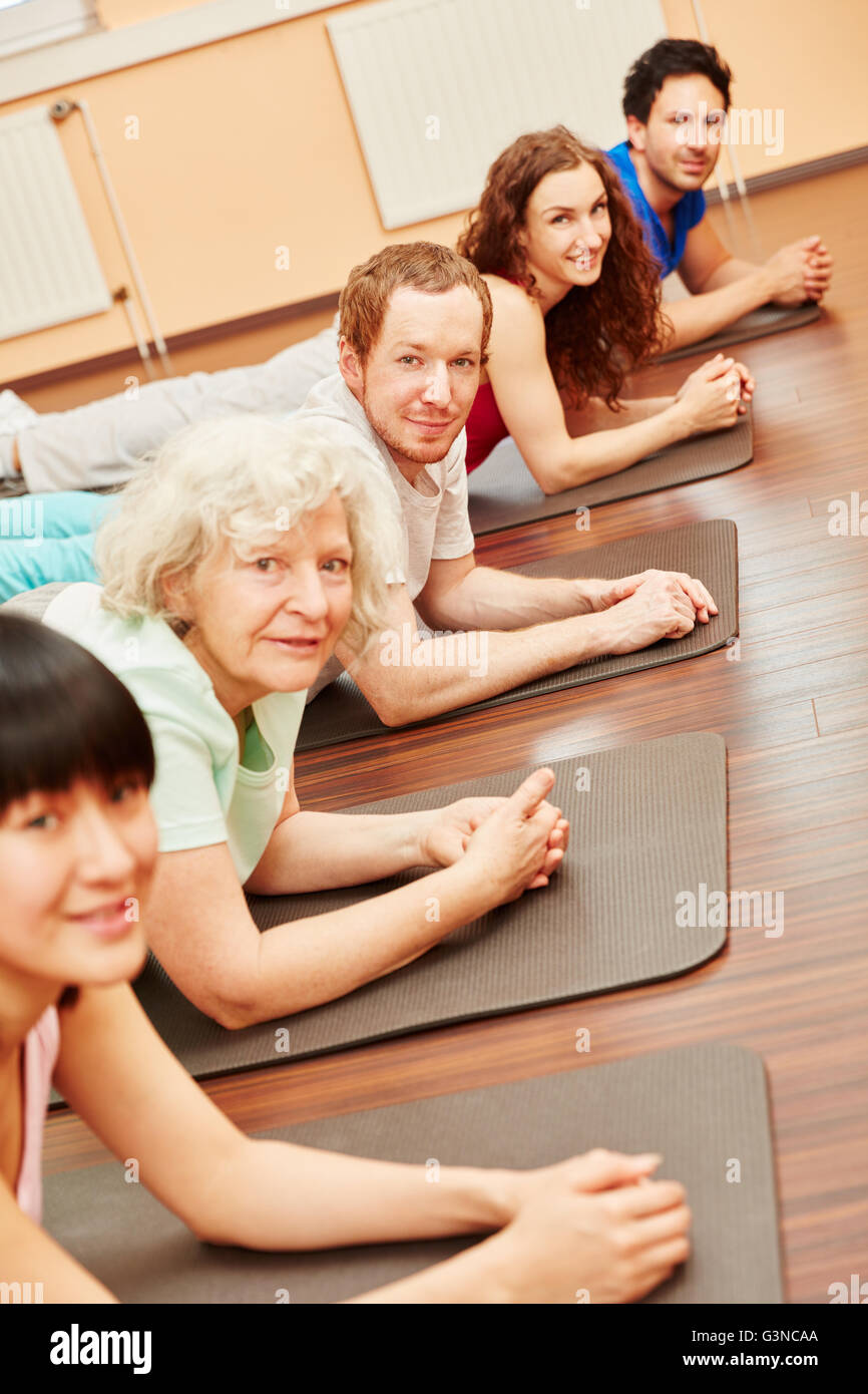 Pilates class with active senior woman at fitness center Stock Photo ...
