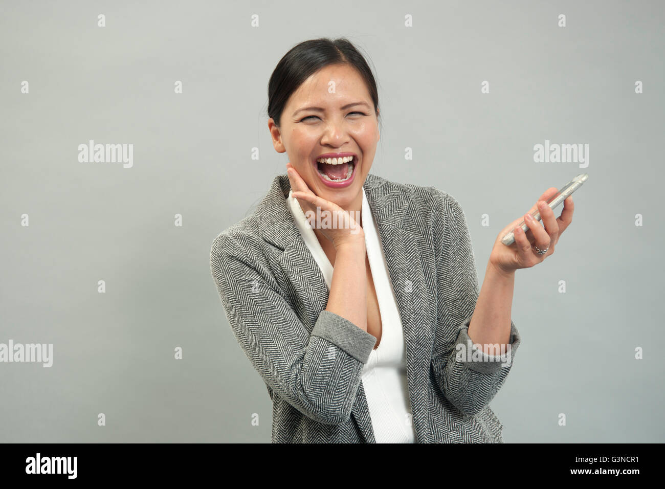 Asian girl laughing hi-res stock photography and images - Alamy