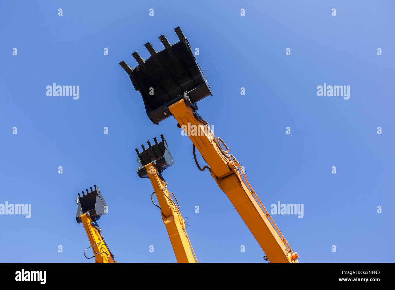 Earthwork industrial excavators steel bucket bins machines closeup ...