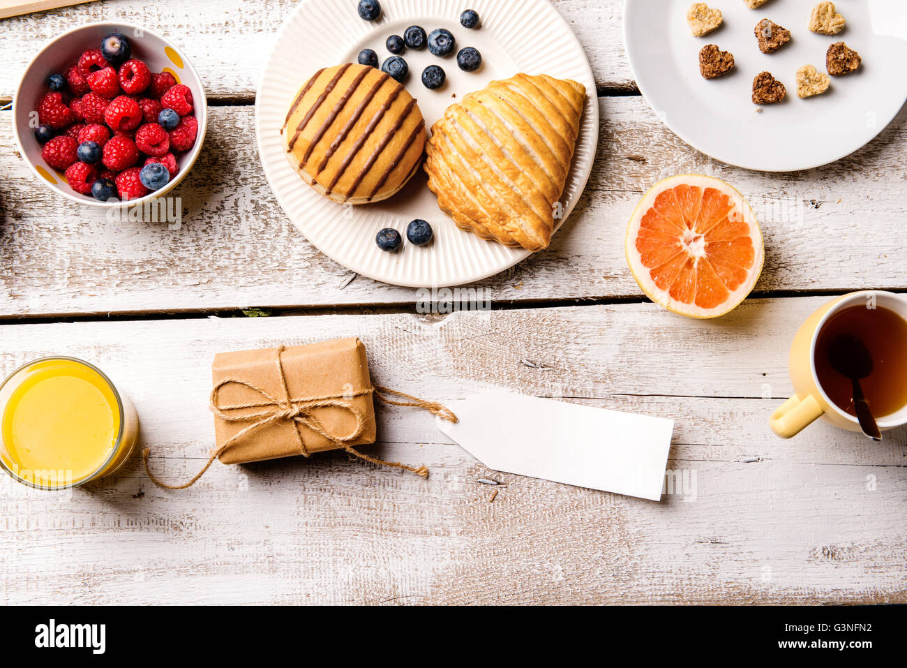 Breakfast meal. Empty tag. Studio shot on wooden background Stock Photo ...