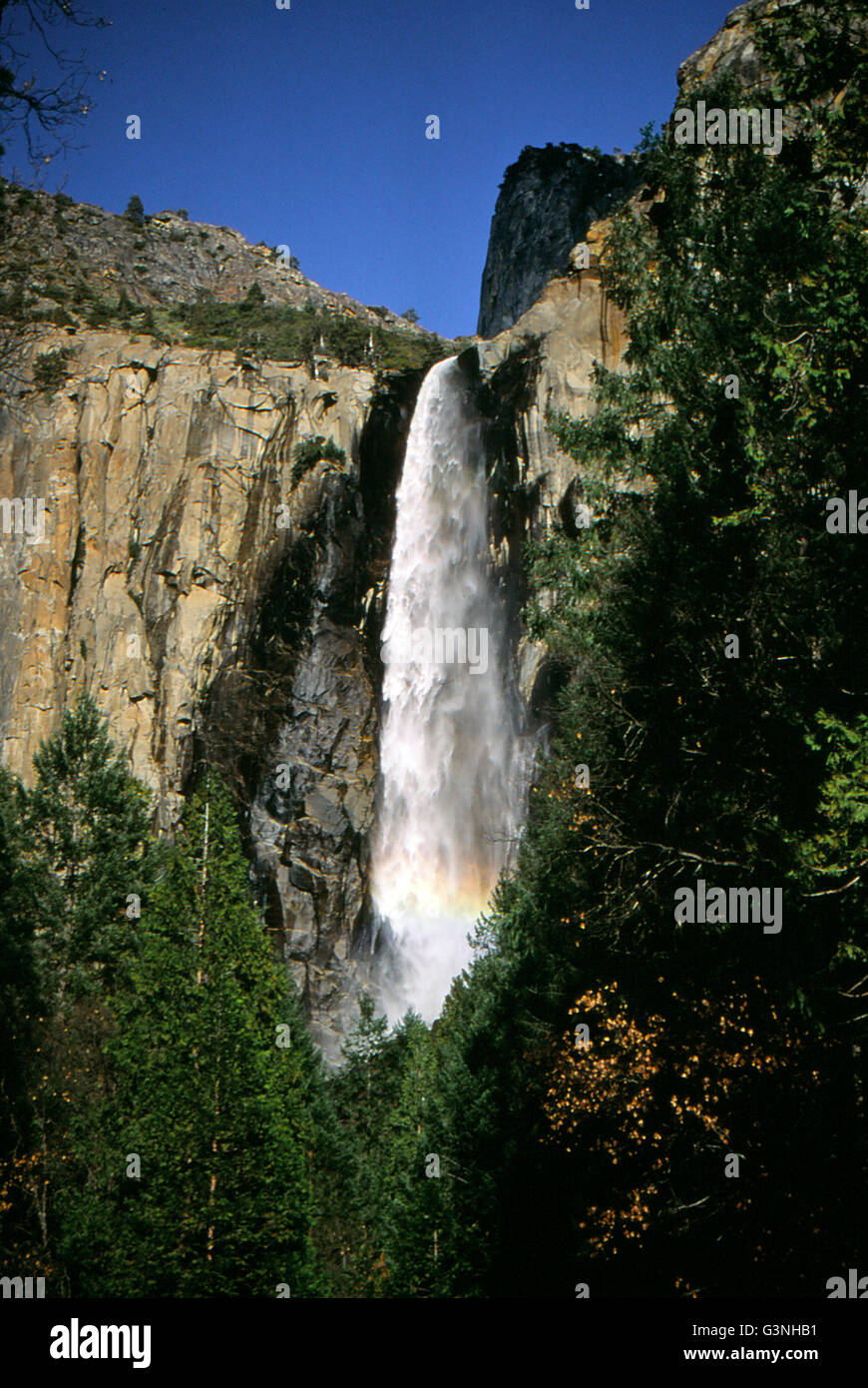 Rainbow in Yosemite Falls, Yosemite National Park in the high siera of ...