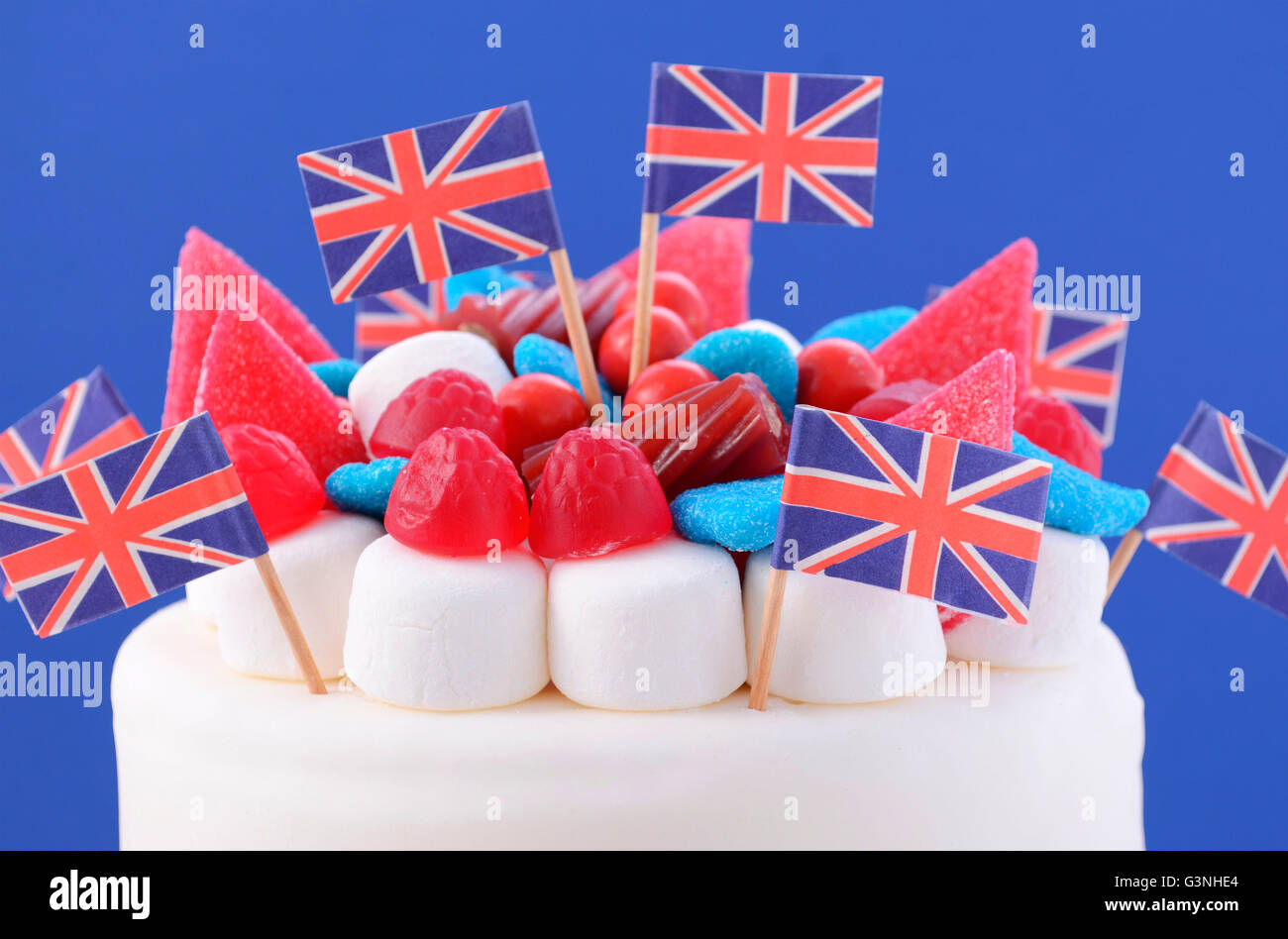 UK celebration cake with flags, marshmallow and candy decorations on a ...