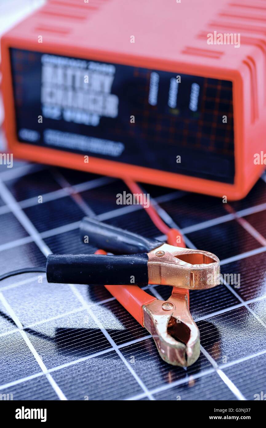 A studio photo close up of a battery charger Stock Photo - Alamy