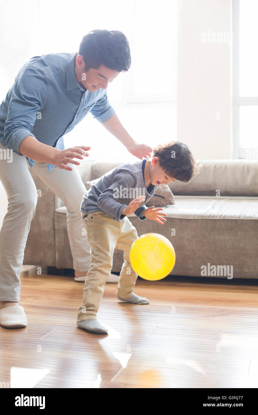 Child bouncing ball hi-res stock photography and images - Alamy