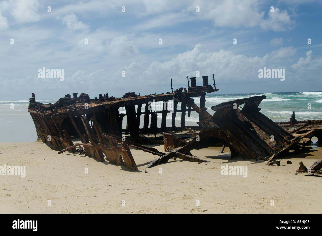 Impressive SS Maheno luxury shipwreck resting on the beach on clear ...