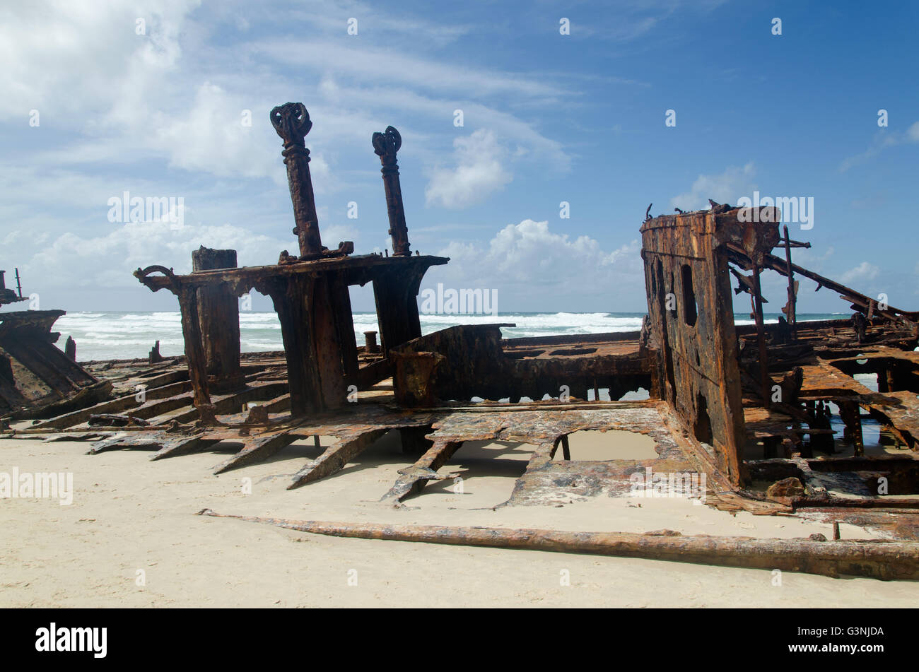 Impressive SS Maheno luxury shipwreck resting on the beach on clear ...