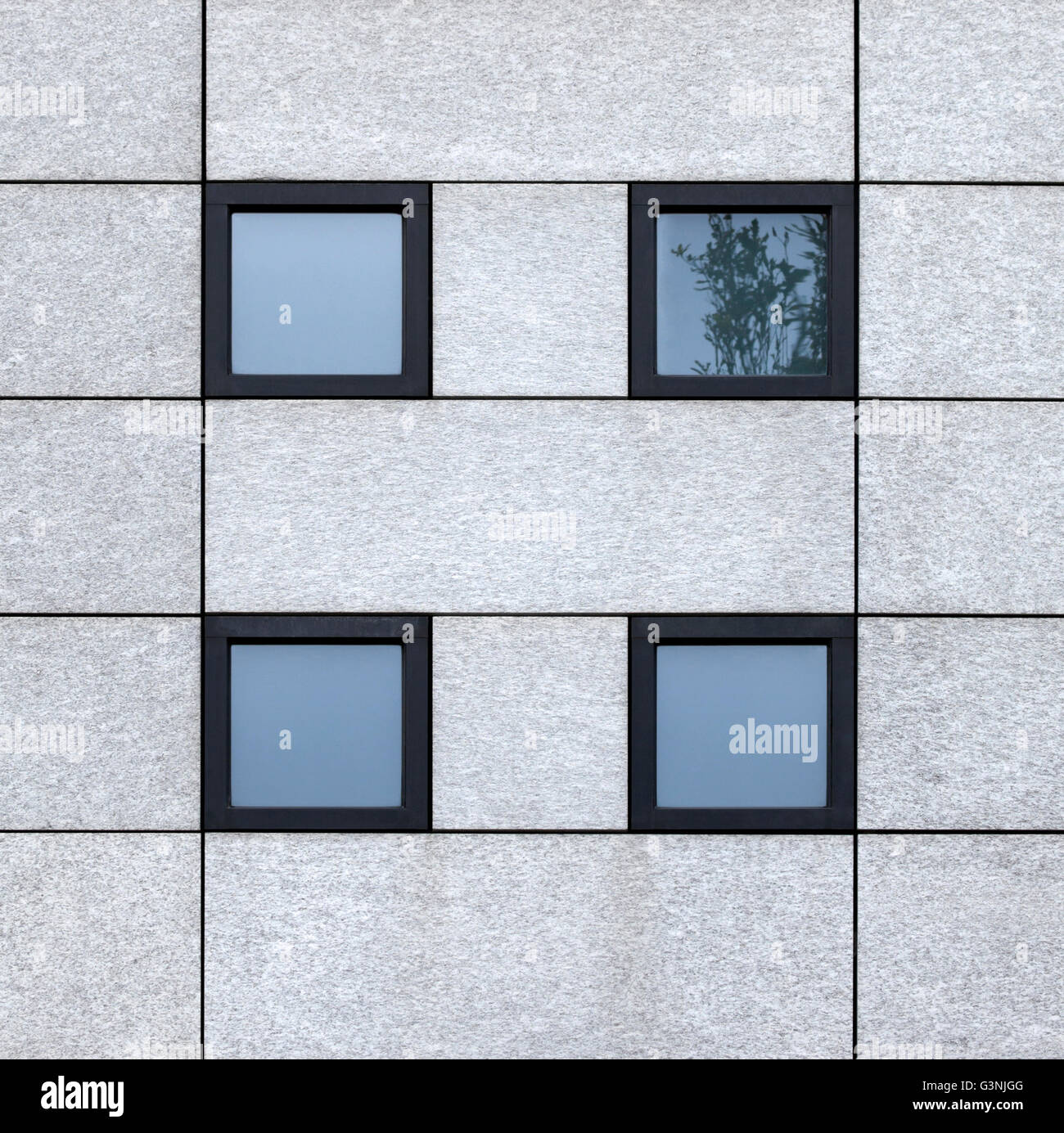 Windows on the facade of a building Stock Photo - Alamy