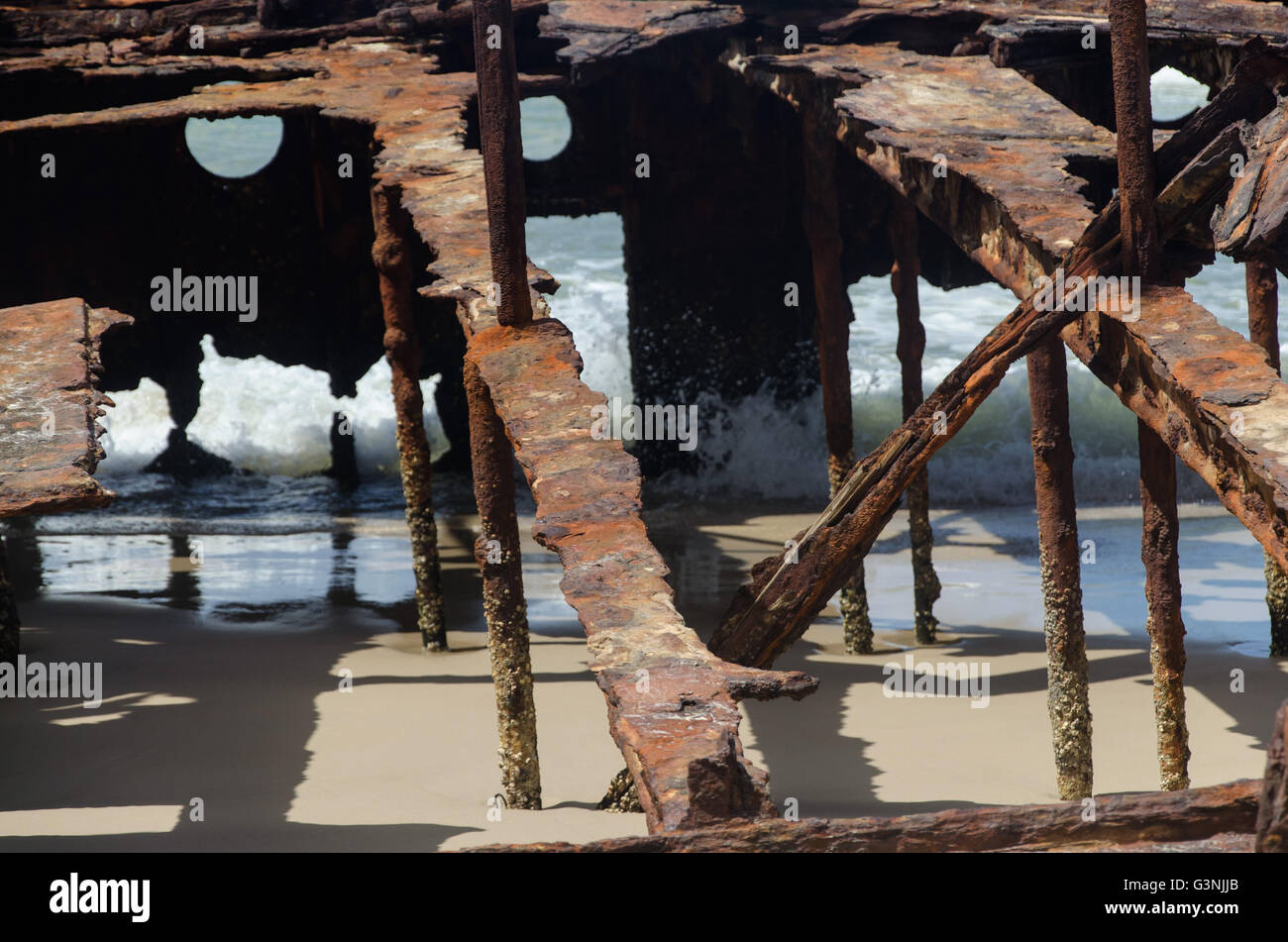 Details of the interior of the SS Maheno luxury shipwreck on clear blue ...