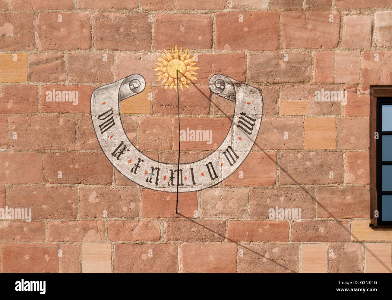Historic sundial on brick wall of Schuerstabhaus, a patrician house ...