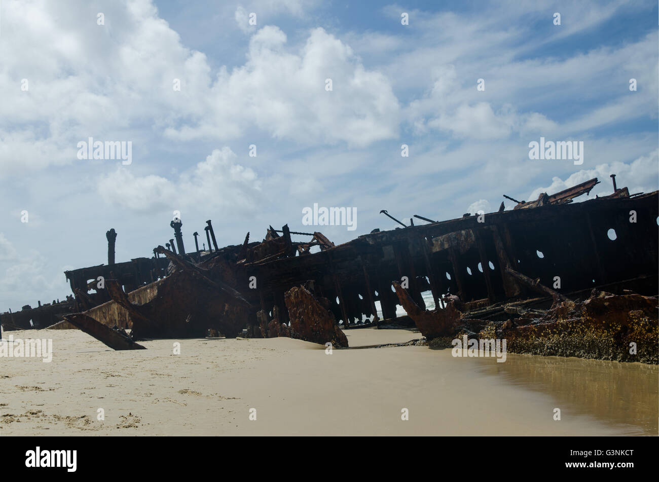 Impressive SS Maheno luxury shipwreck resting on the beach on clear ...