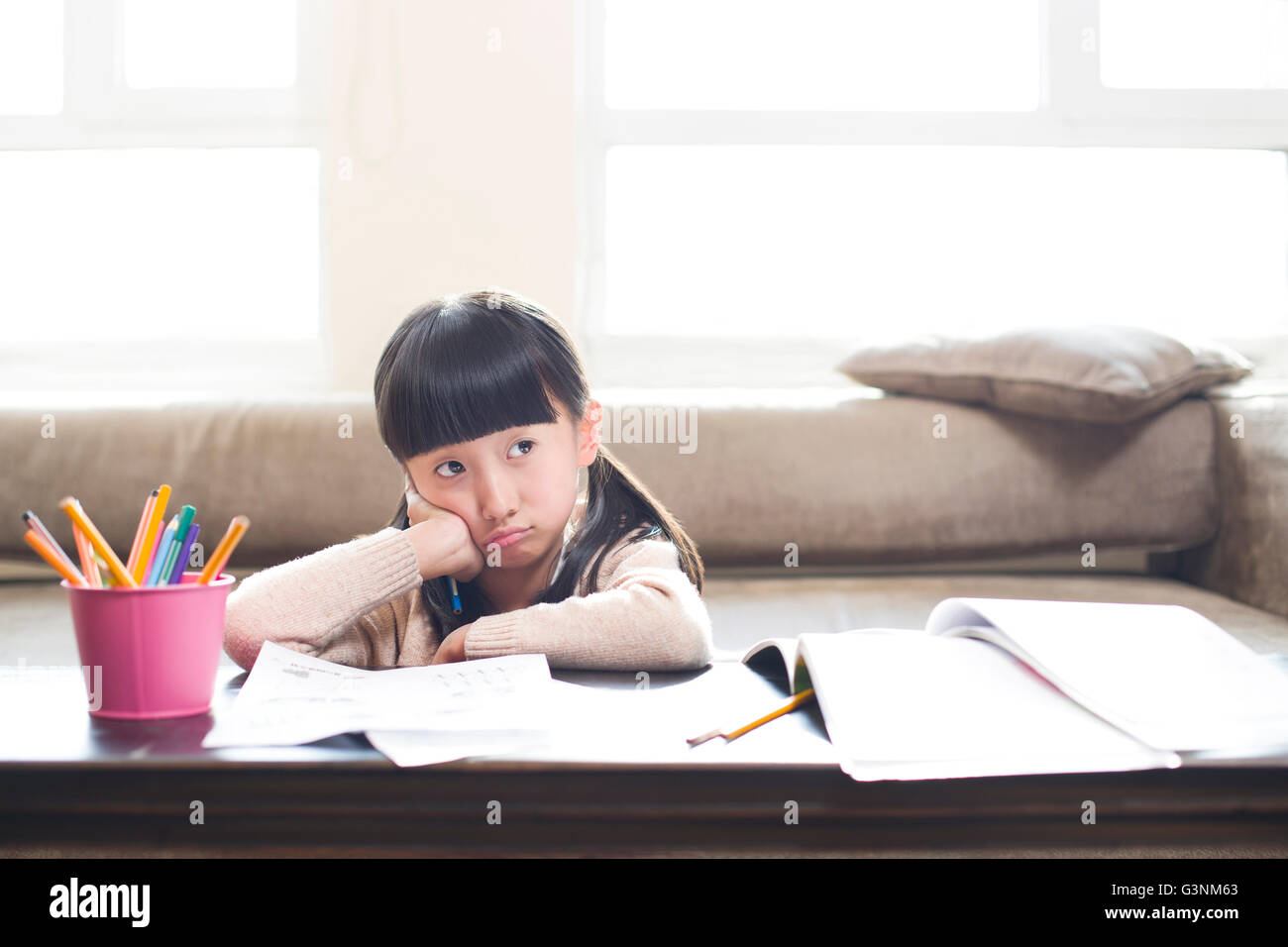 Little girl and homework Stock Photo - Alamy