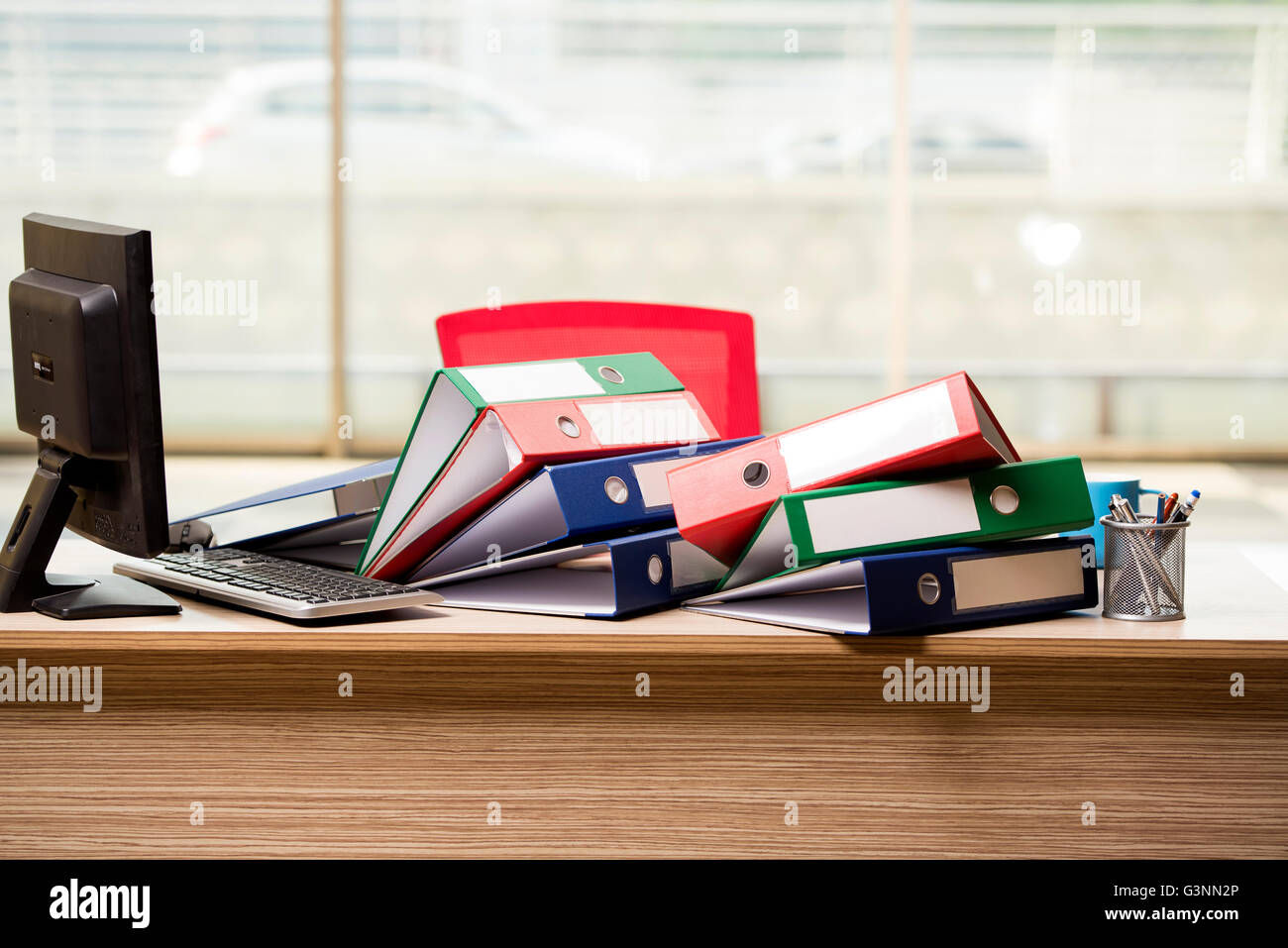 Stacks of office binders on desk Stock Photo - Alamy