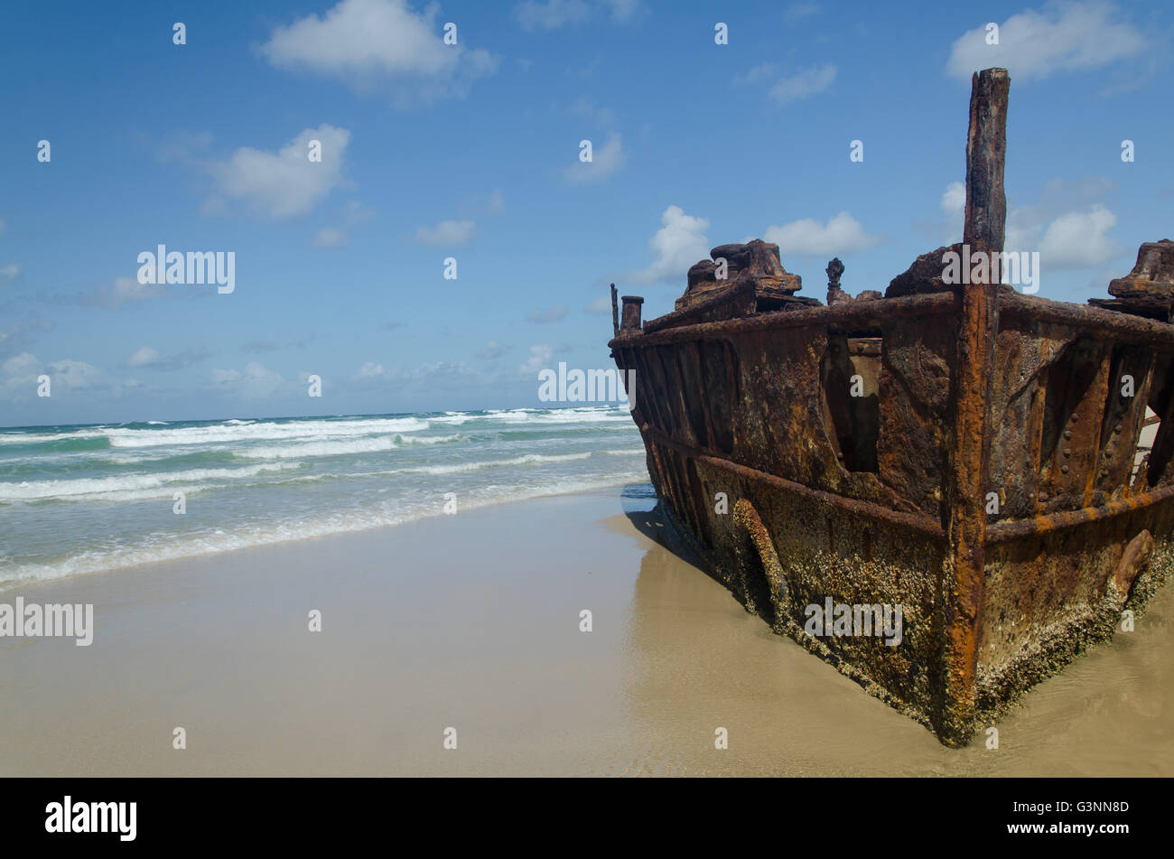Impressive SS Maheno luxury shipwreck resting on the beach on clear ...