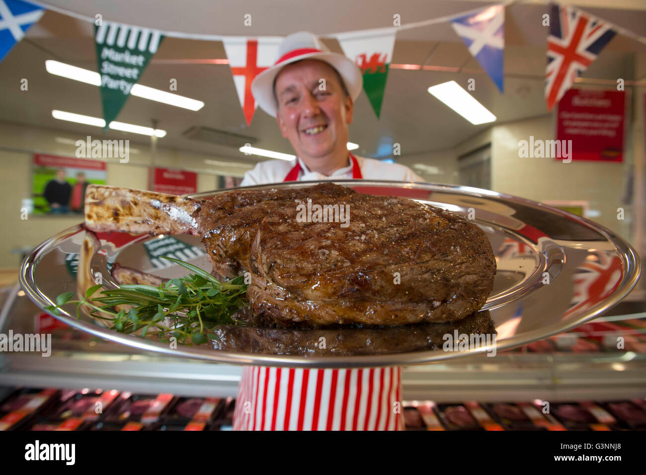 EDITORIAL USE ONLY Pete, Morrisons Market Street Butcher prepares the ...