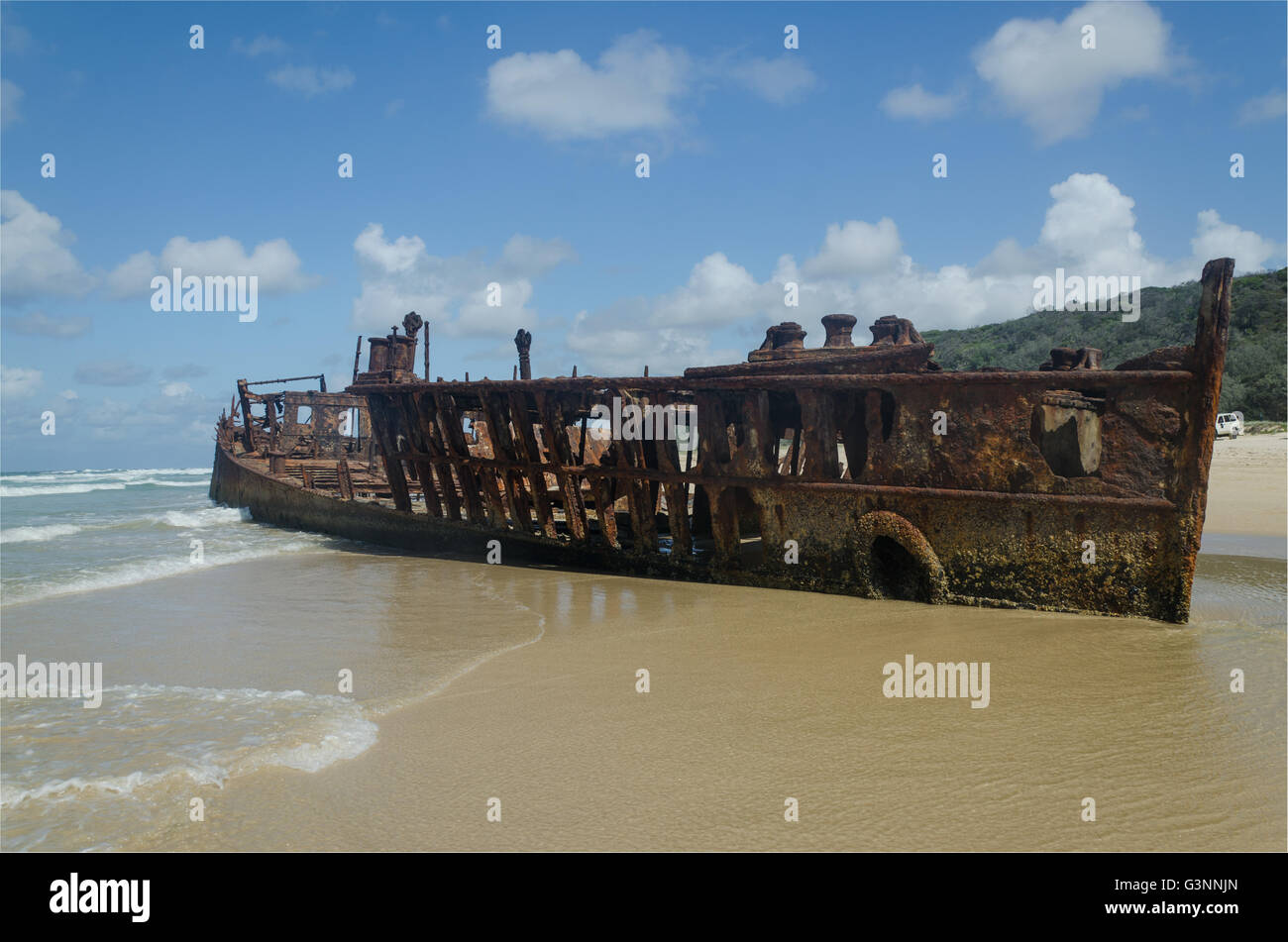Impressive SS Maheno luxury shipwreck resting on the beach on clear ...