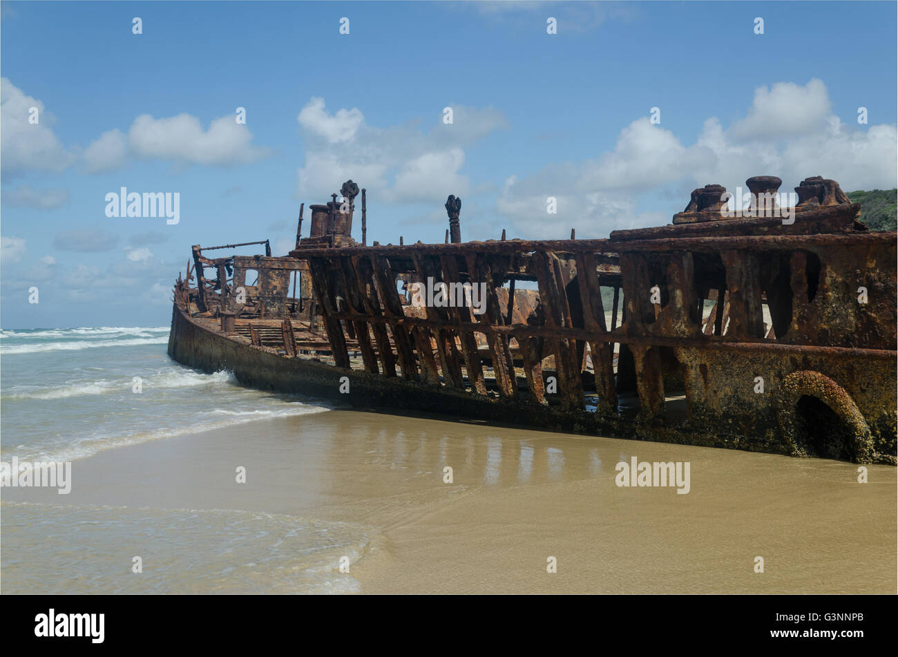 Impressive SS Maheno luxury shipwreck resting on the beach on clear ...