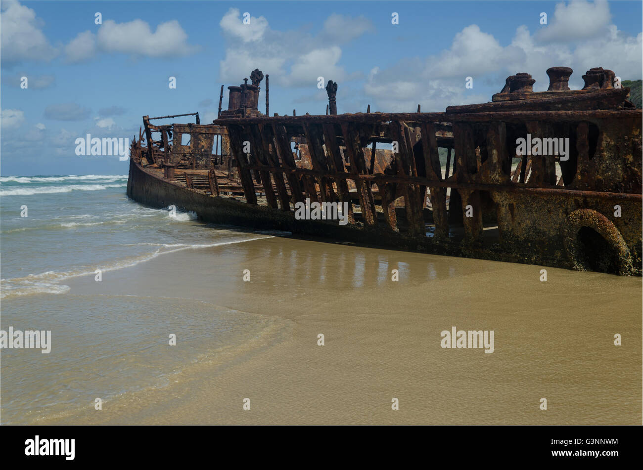 Impressive SS Maheno luxury shipwreck resting on the beach on clear ...