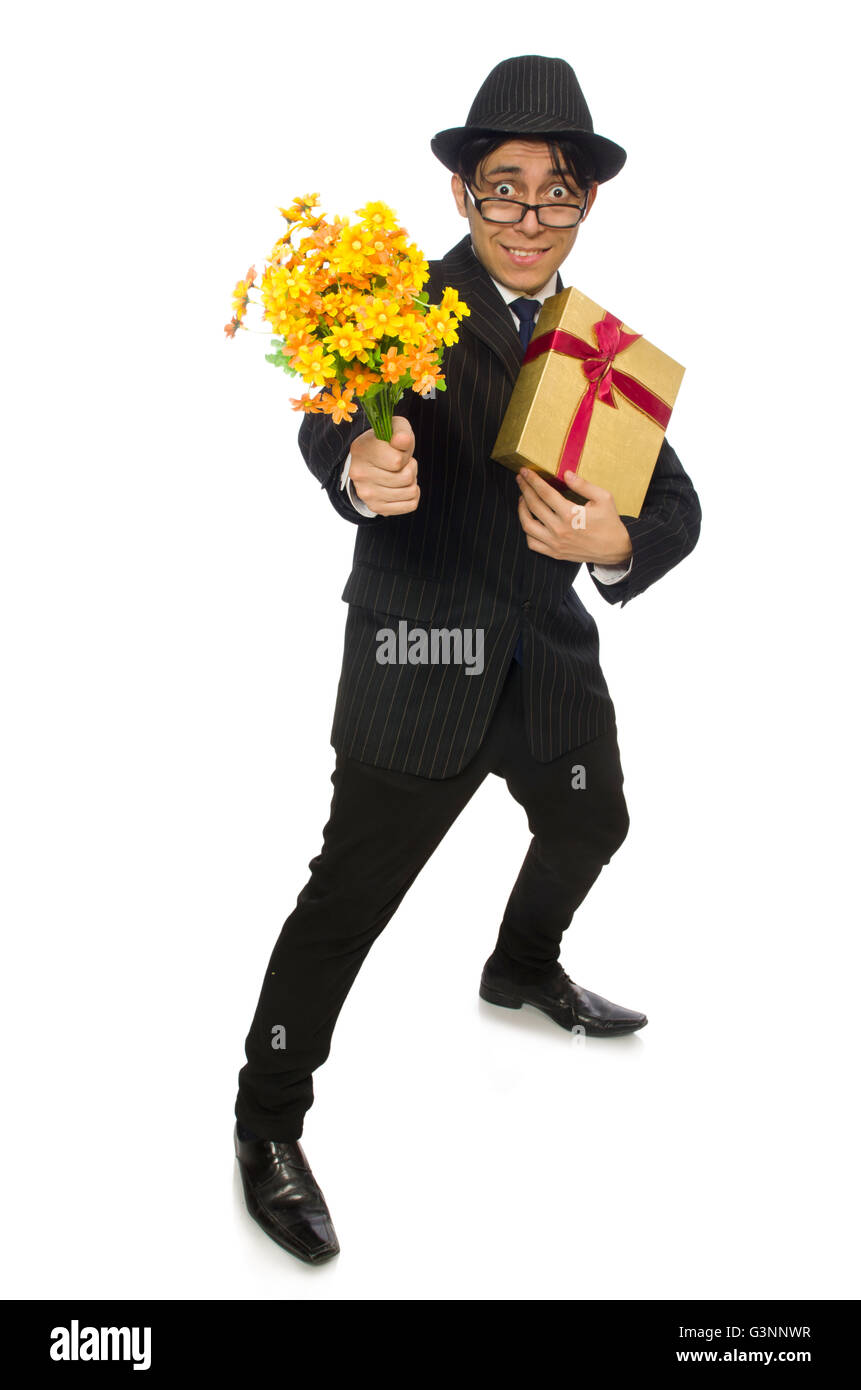 Funny man with flowers and giftbox Stock Photo - Alamy