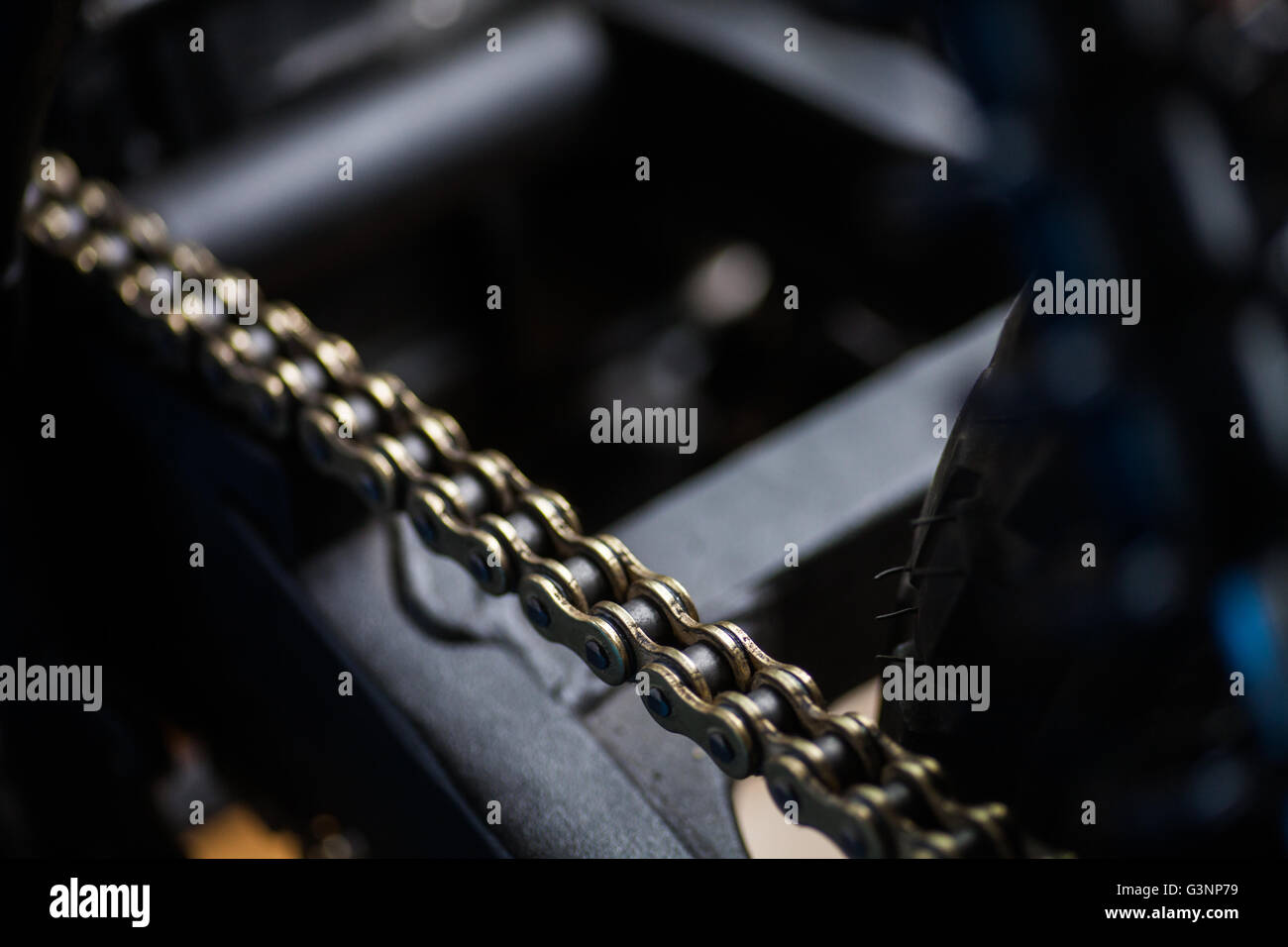 Color image of a used motorcycle chain Stock Photo - Alamy