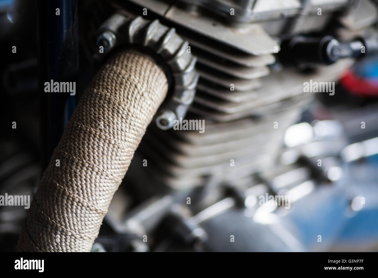 Detail of a motorcycle exhaust pipes and cylinders Stock Photo - Alamy