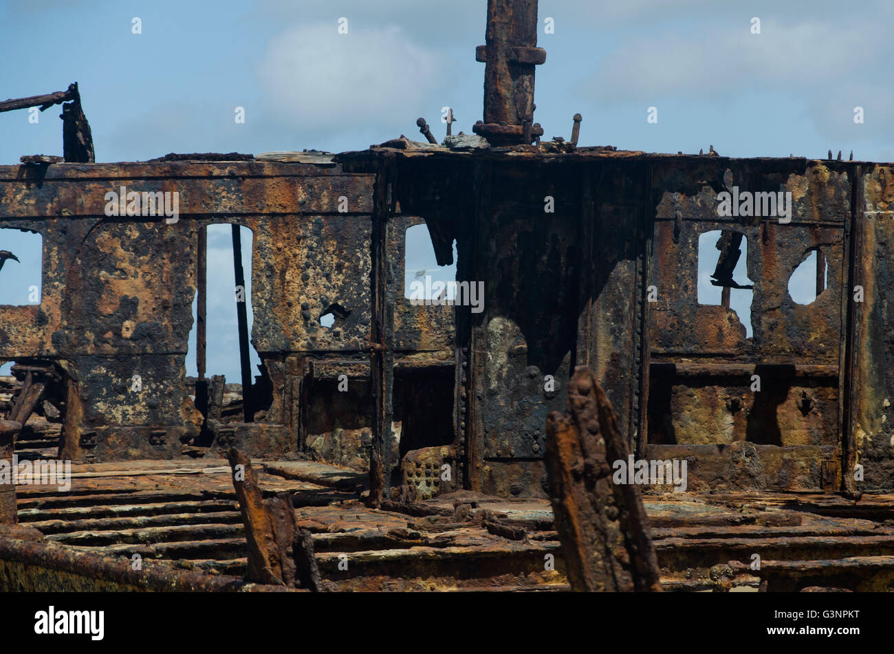 Details of the interior of the SS Maheno luxury shipwreck on clear blue ...